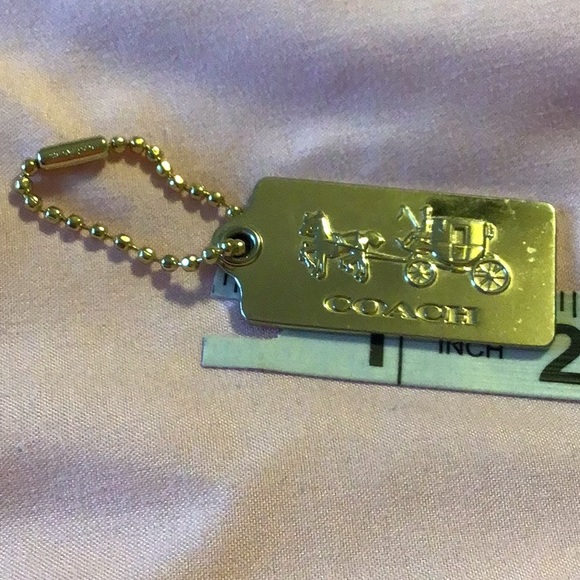 Coach | Accessories | Gold Coach Horse Hangtag | Poshmark
